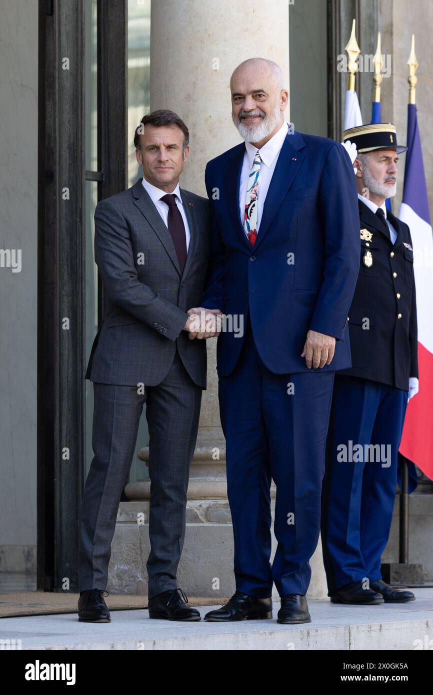 Paris, France. 12th Apr, 2024. French President Emmanuel Macron greets ...