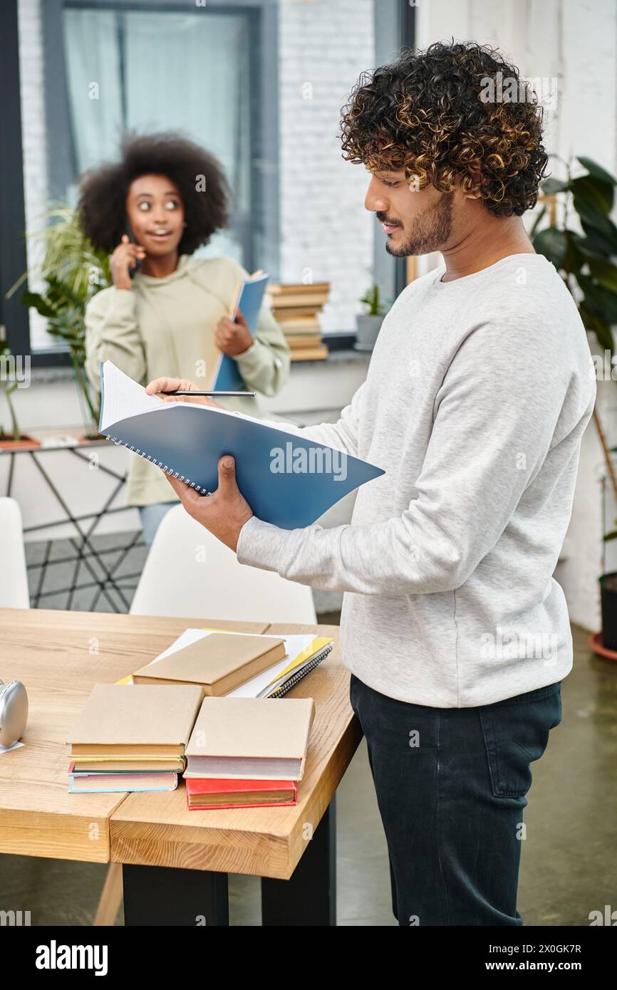 Black man studying in library hi-res stock photography and images - Alamy