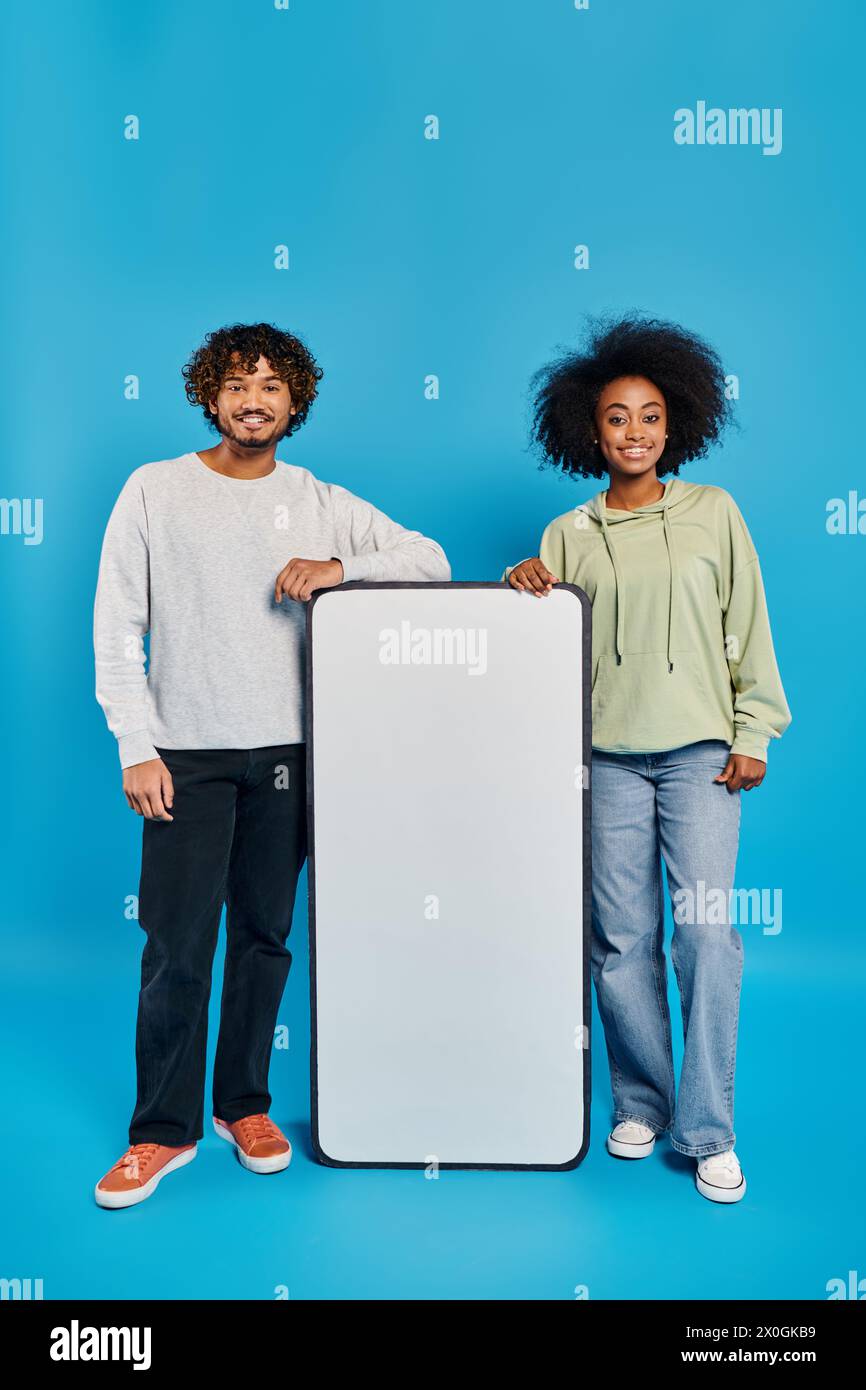 A couple of people from different cultural backgrounds stand side by ...