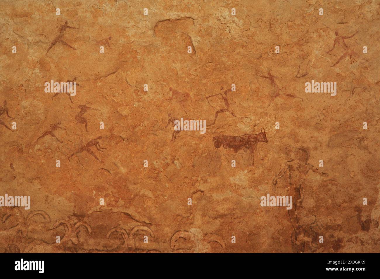 Rock carving with hunters and animals in Sefar, Tassili N'Ajjer ...