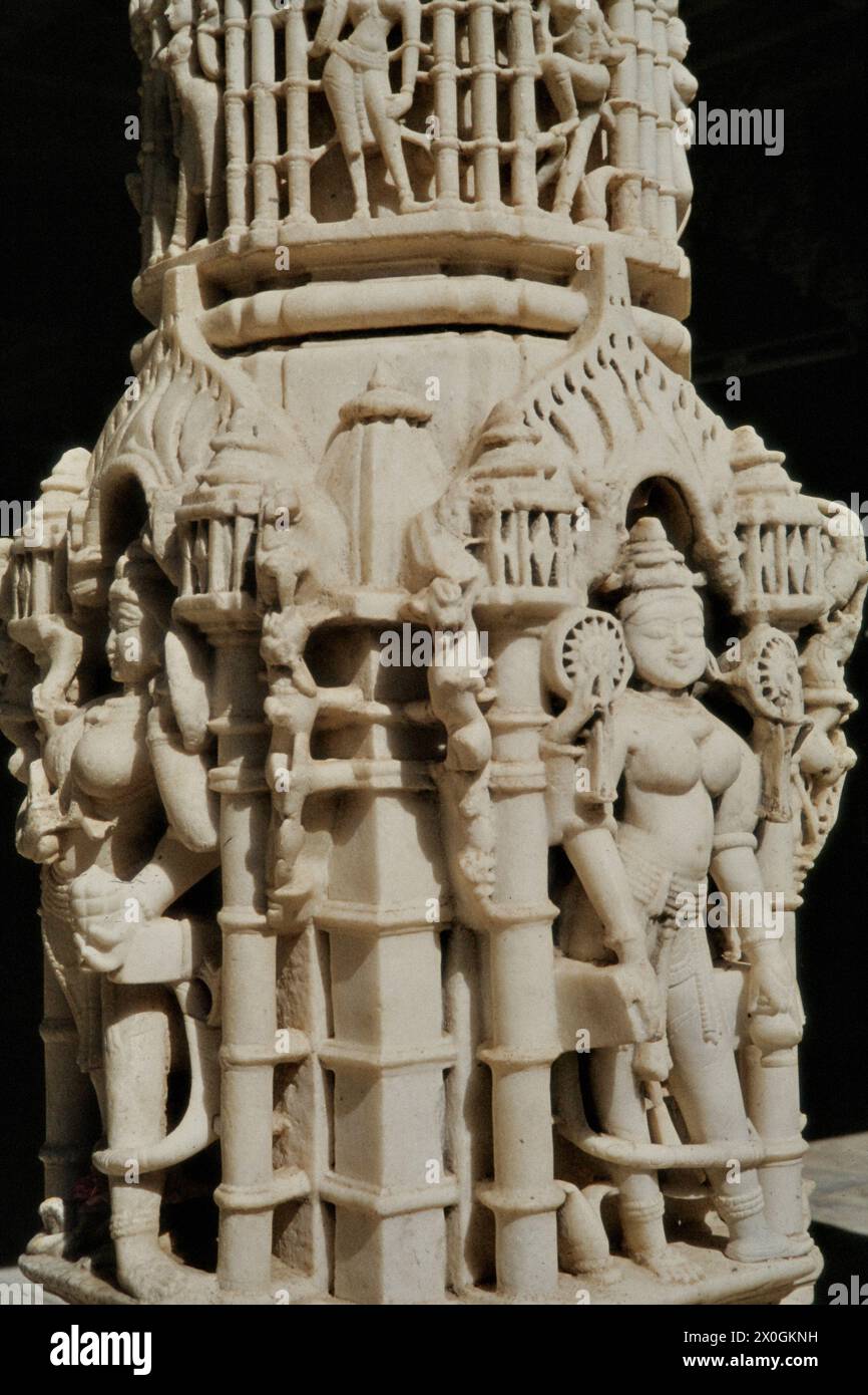 Detail of a column decorated with figures of deities in the Dilwara Temple in Mount Abu ...