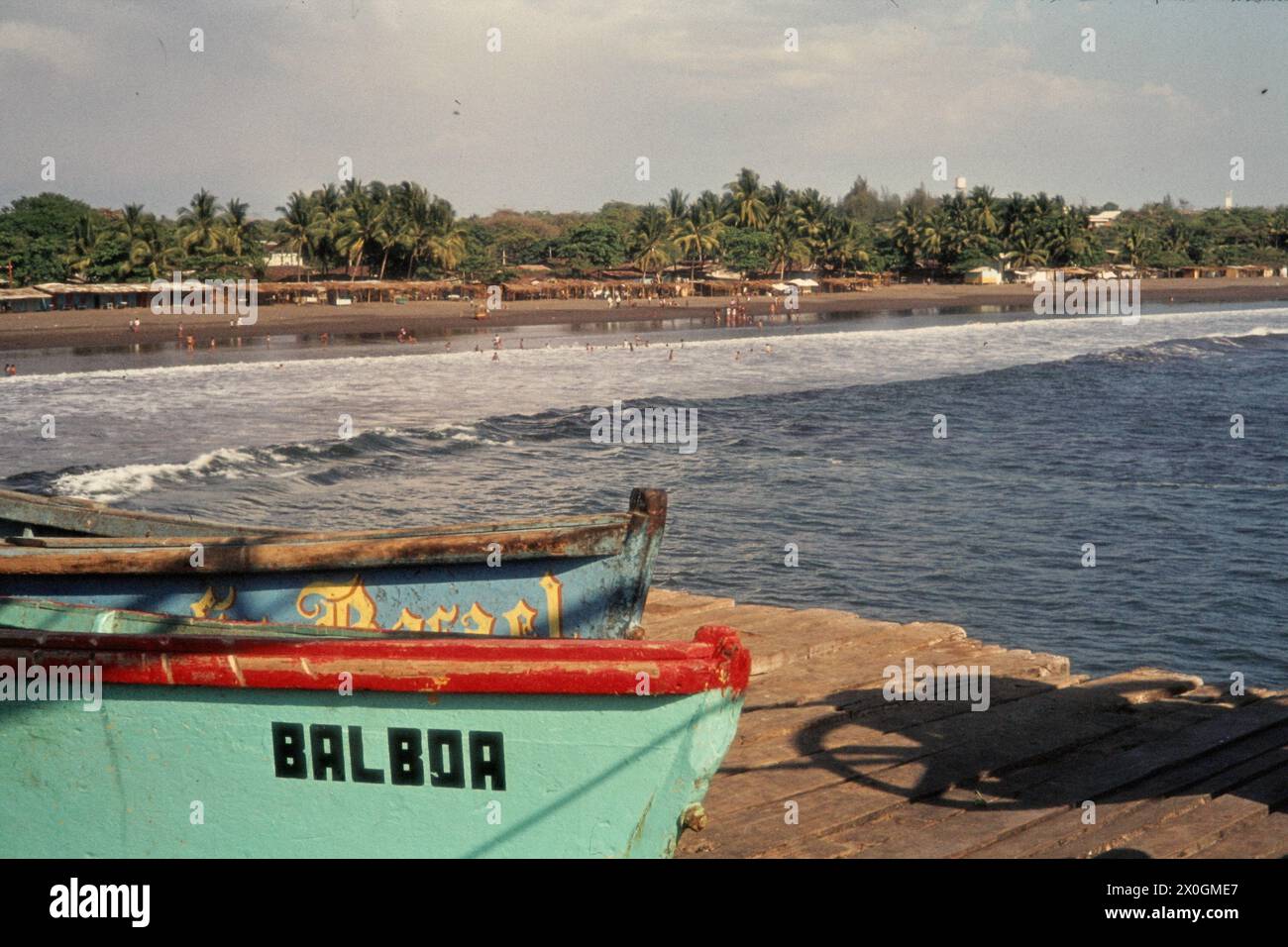 Boats on a jetty on the beach of Acajutla on the Pacific coast ...