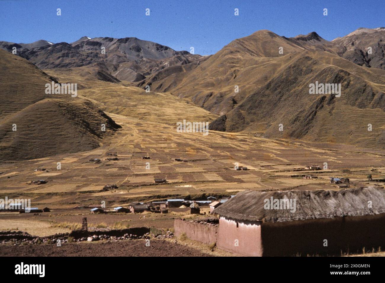 An agricultural village on the slope of a mountain in Abra La Raya ...