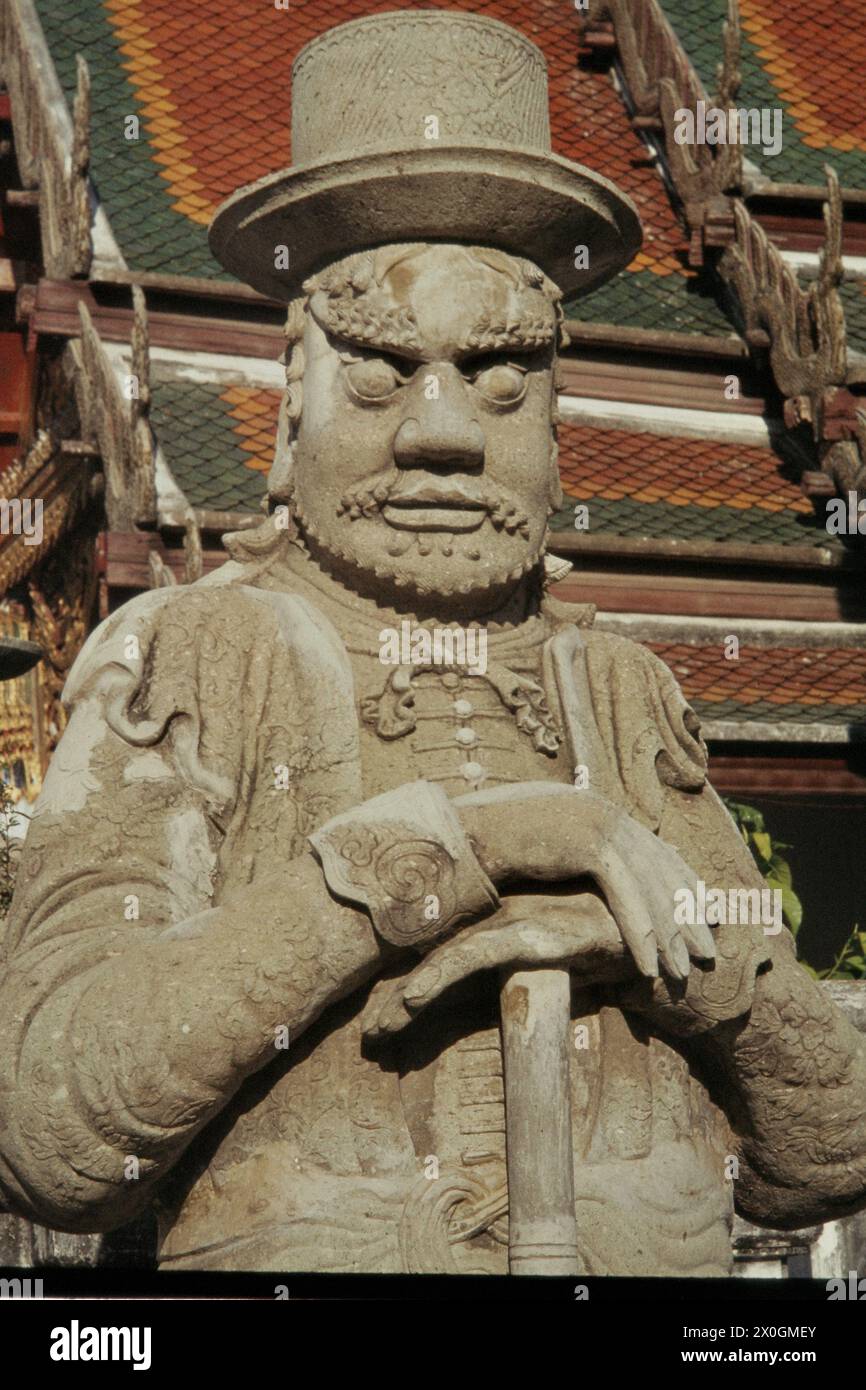 "Stone guardian figure with ""Dutchman's hat"" in front of the temple ...