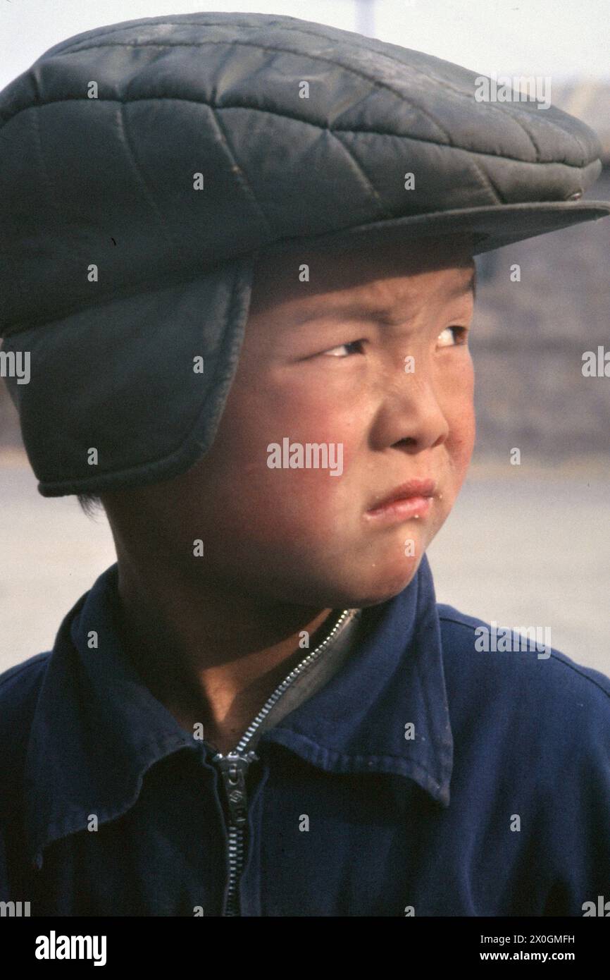 A Chinese boy in a cap in Juyong Pass. [automated translation] Stock ...