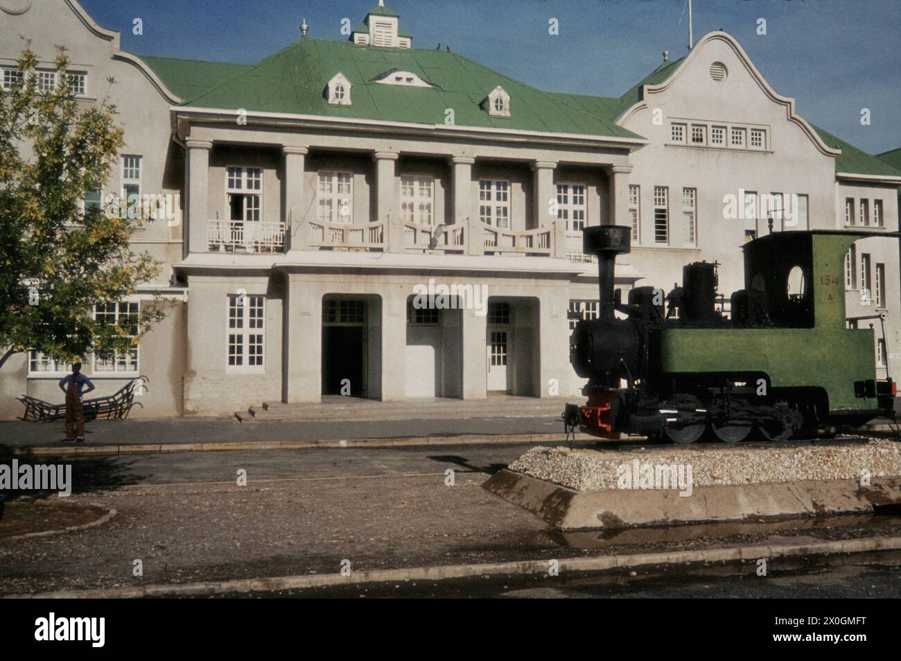 Railway station and locomotive from the colonial period at the turn of ...