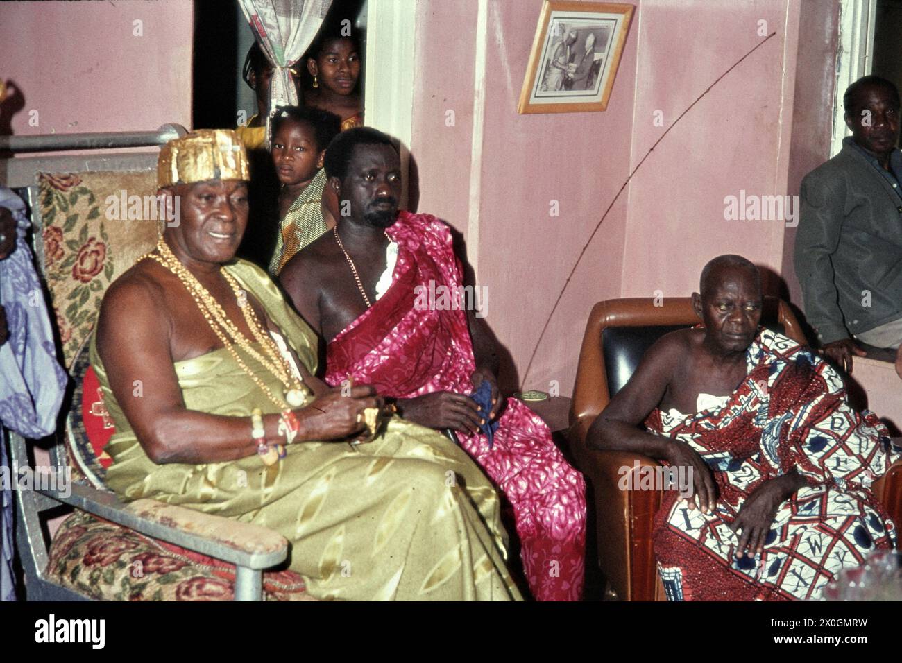 The Royal Chancellor (left) and the chief of the village (right) sit on ...