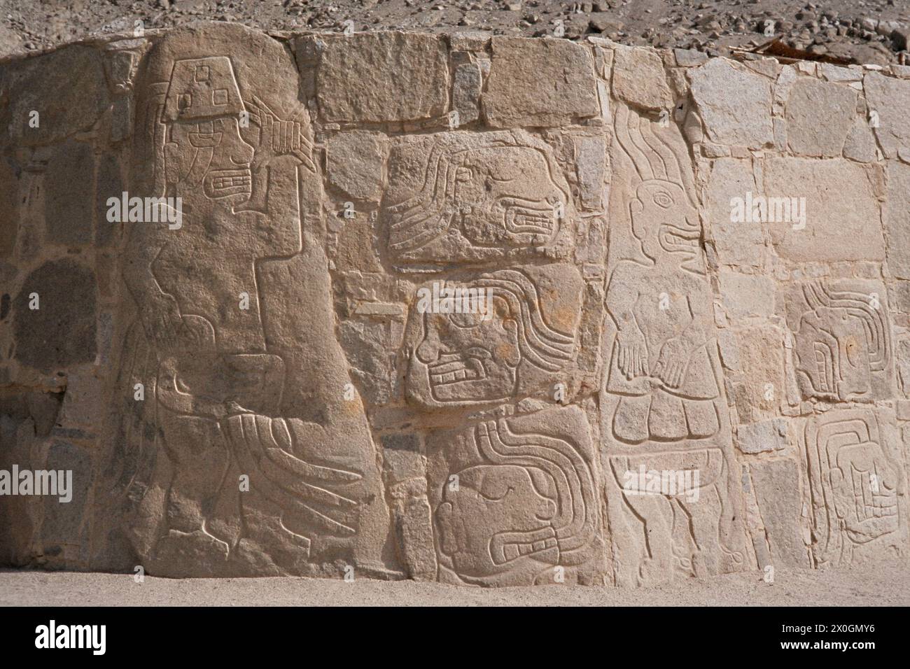 Reliefs of stacked heads in the Cerro Sechín excavation site in Peru ...