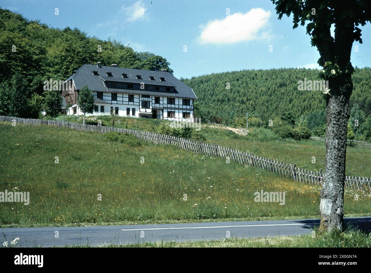 View from a street to the Hellenthal Youth Hostel in half-timbered ...