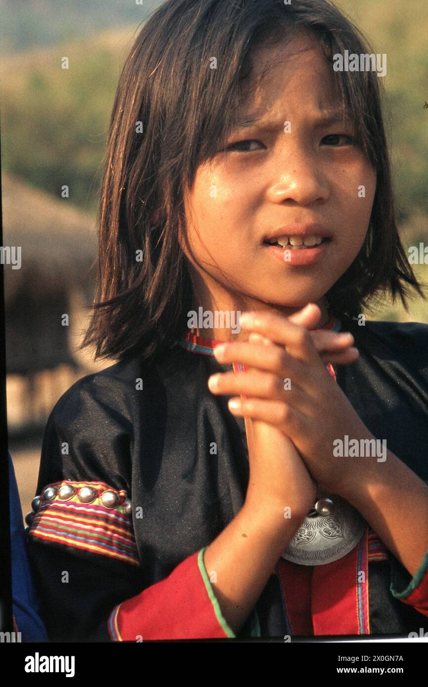 A young girl from the Lahu ethnic group with traditional clothing ...