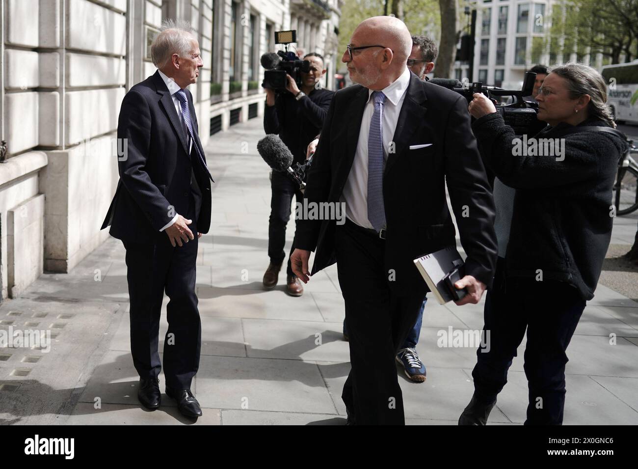 Alan Cook (left), former independent non-executive director and ...