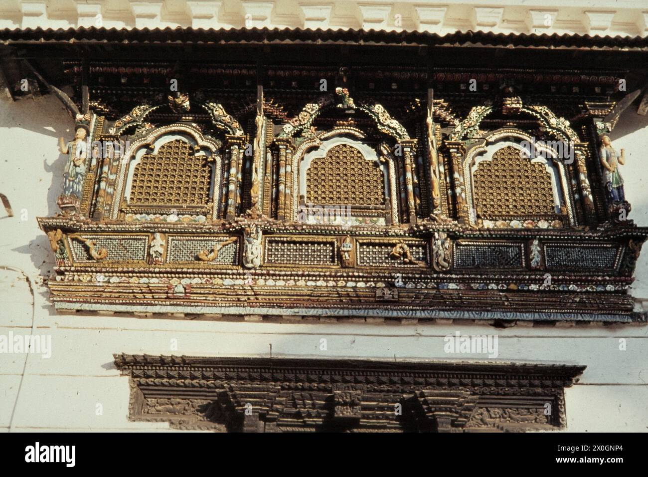 Carved wooden window with many ornaments on the west side of the royal ...