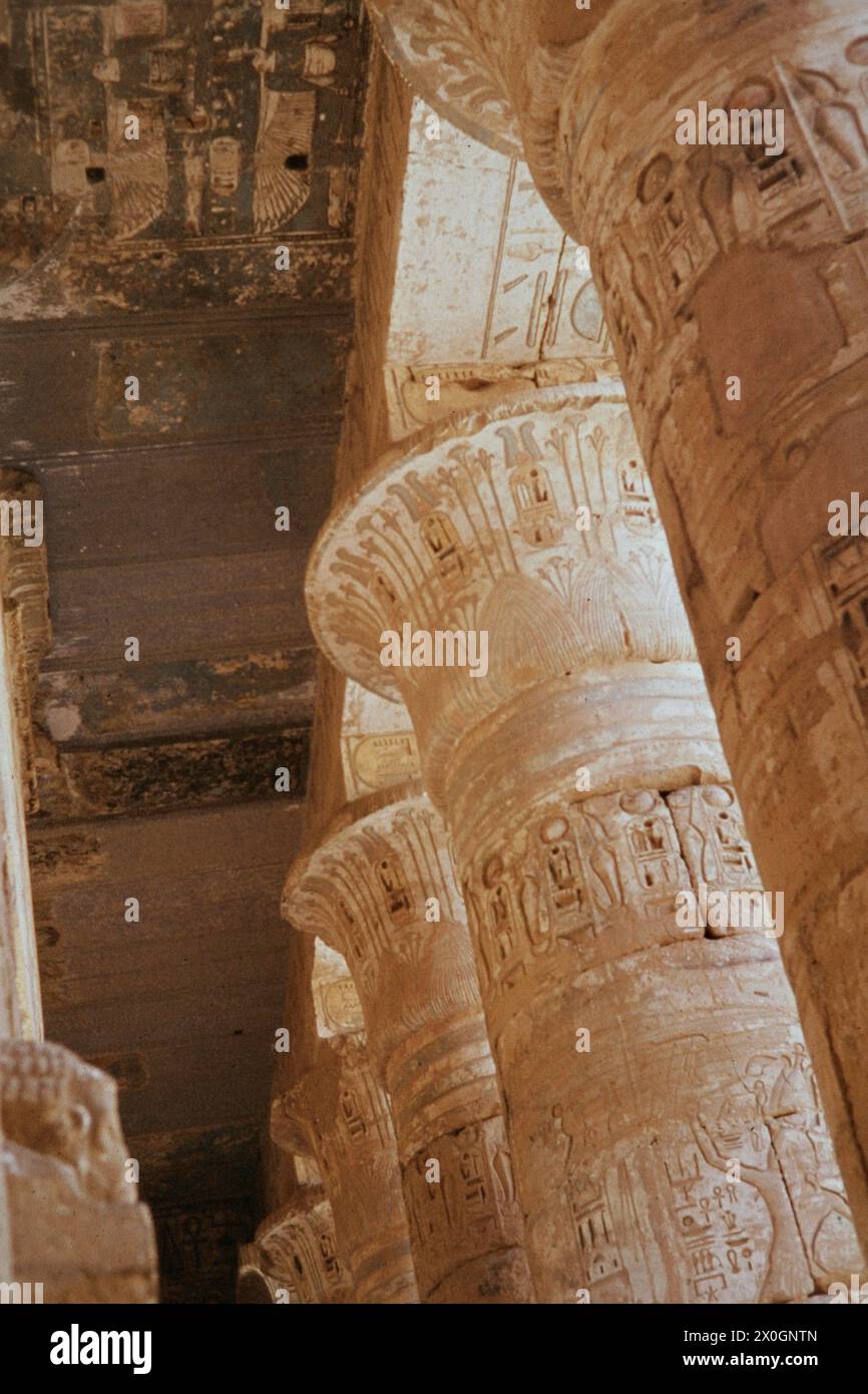 "Columns with reliefs in the first courtyard of the Medinet Habu Temple ...