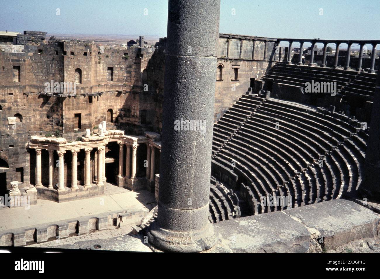 View of the columns of the stage of a Roman theater in Bosra Stock ...