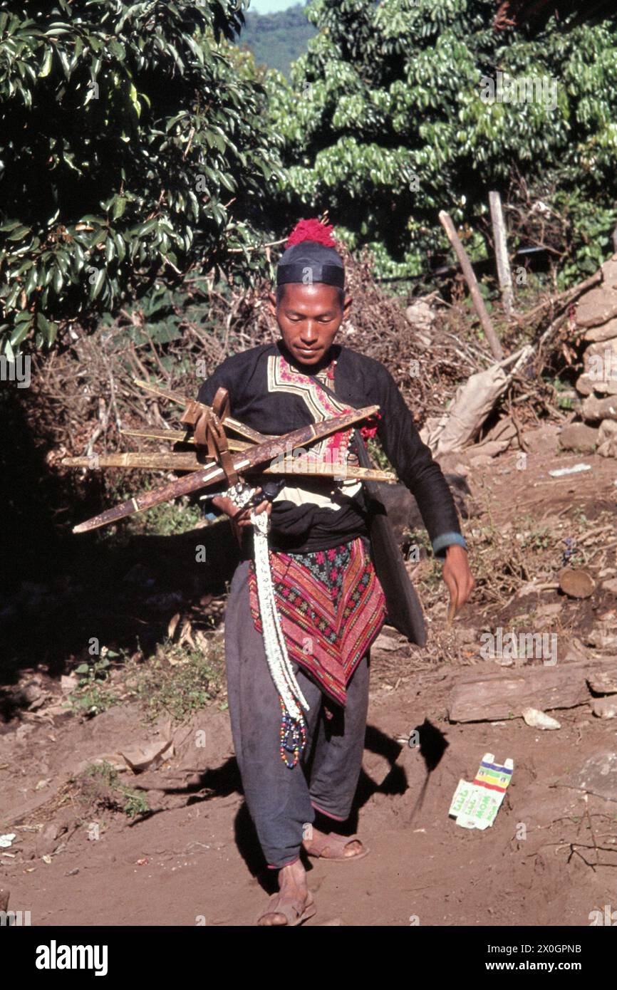 A man of the ethnic group Meo (also Hmong) in traditional clothing in a ...