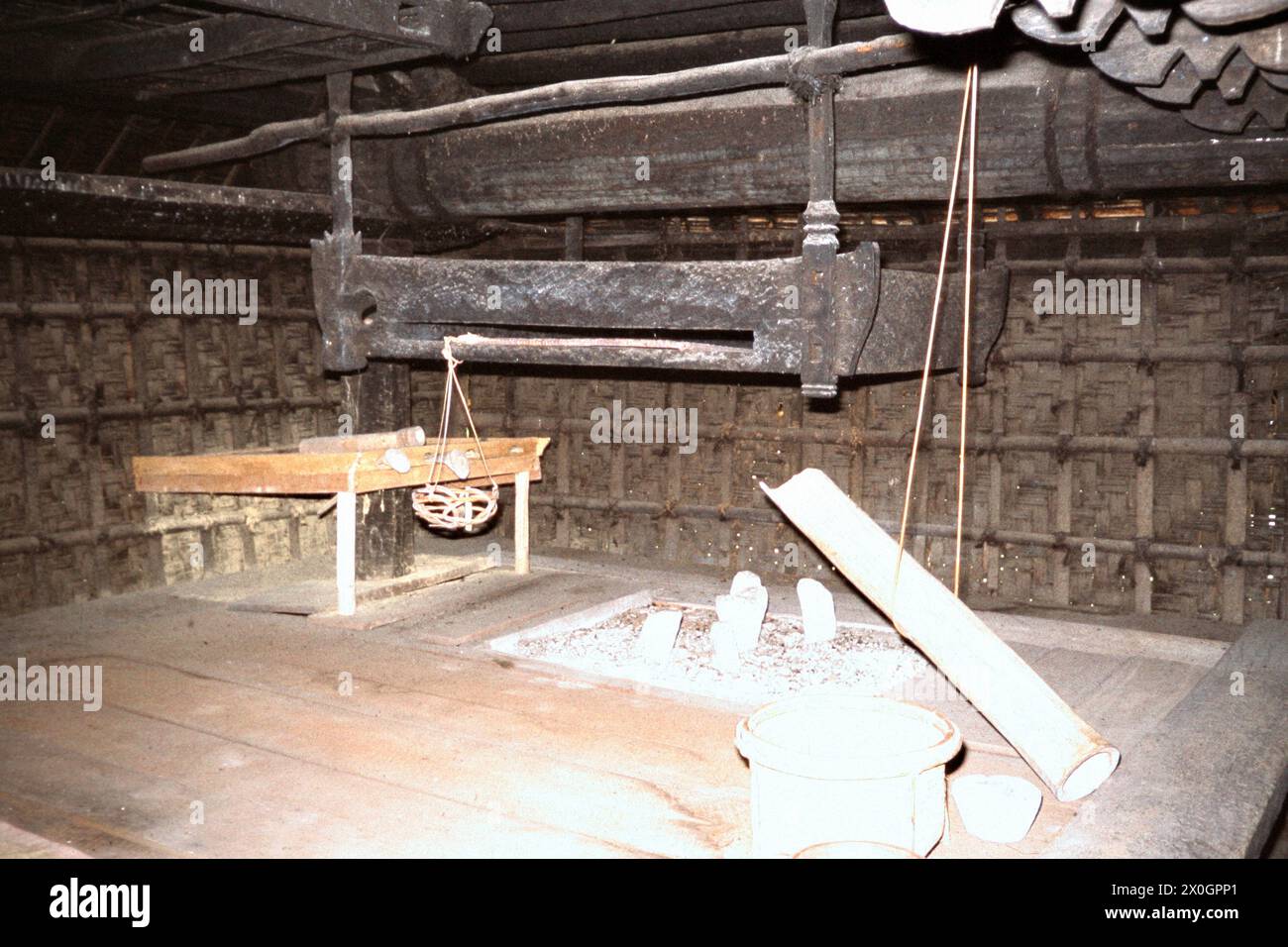 A fireplace in the royal longhouse in Pematang Purba. [automated ...