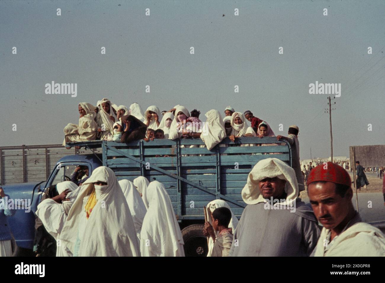 A carriage filled with travellers during a big folk festival in ...