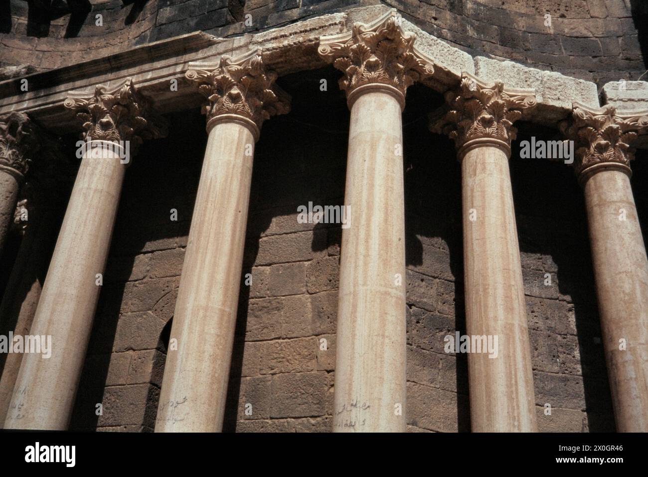 Corinthian columns with capitals on the stage of a Roman theater in ...