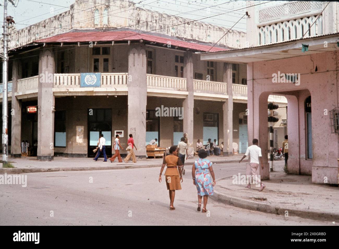 Pedestrians on an old German colonial road in the centre of Dar es ...