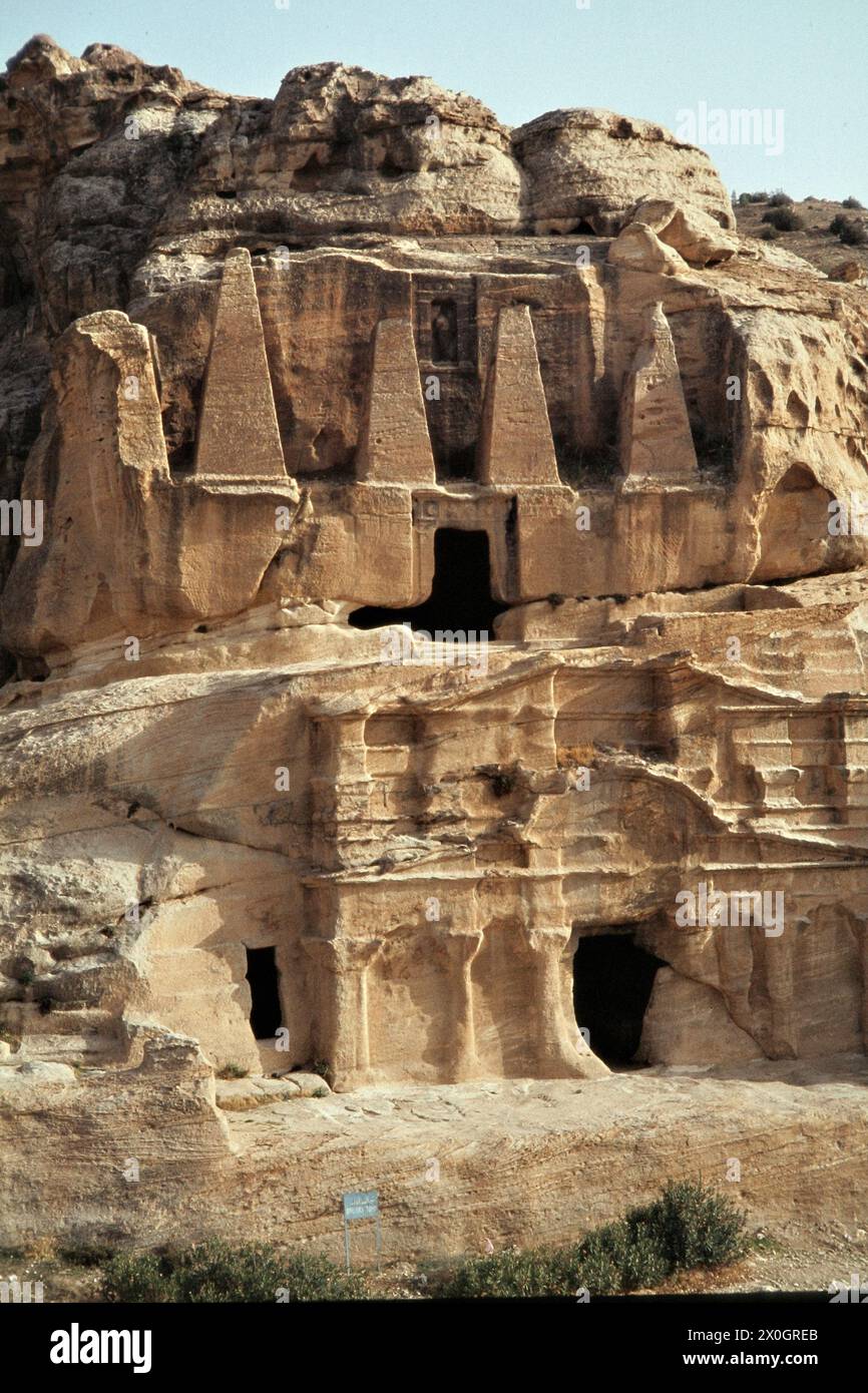 View of the pyramid grave in Petra which is built into a rock wall ...