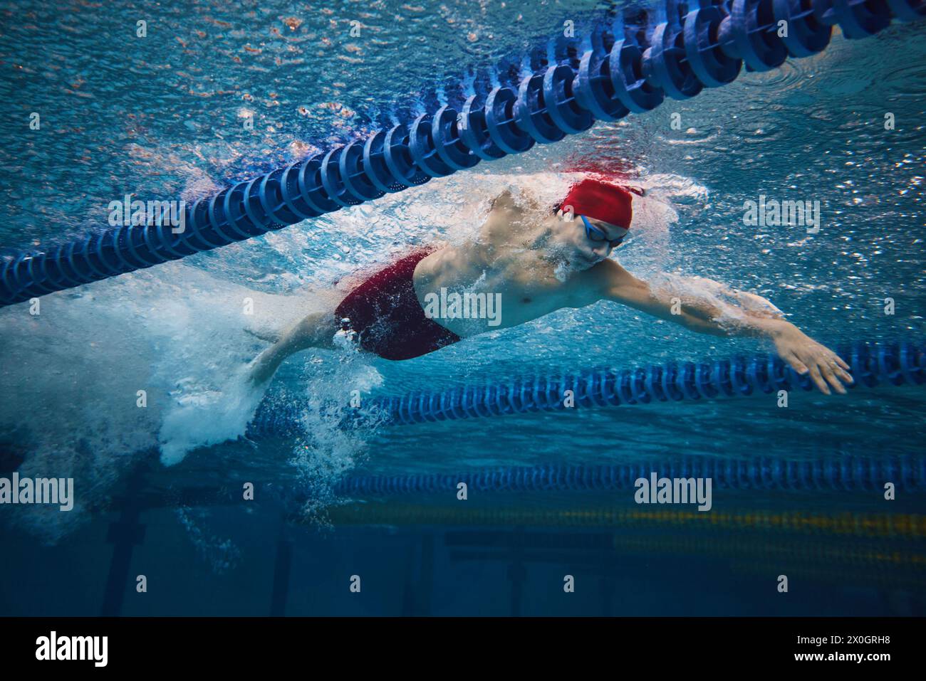 Reaching athletic achievement. Competitive, focused young man, swimmer ...