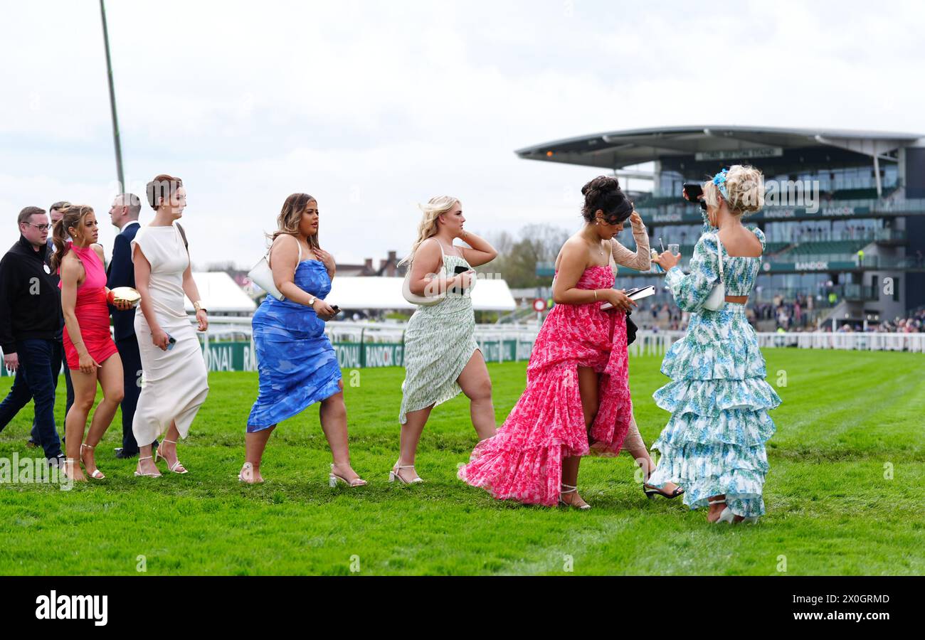 Racegoers crossing the track on day two of the 2024 Randox Grand ...
