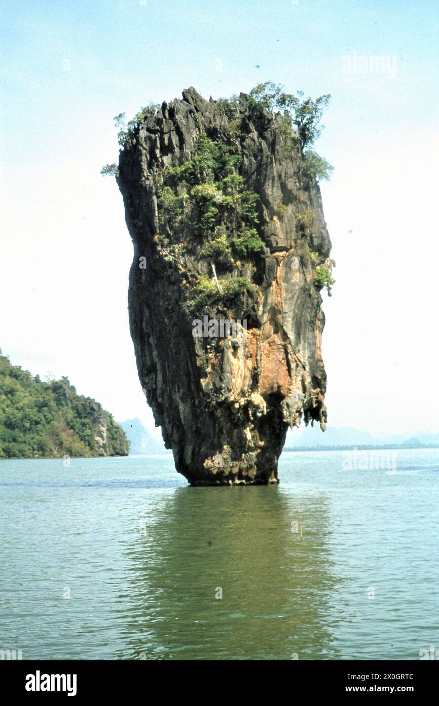 Rock of Khao Ping Khan (also called James Bond Island) in the bay of ...