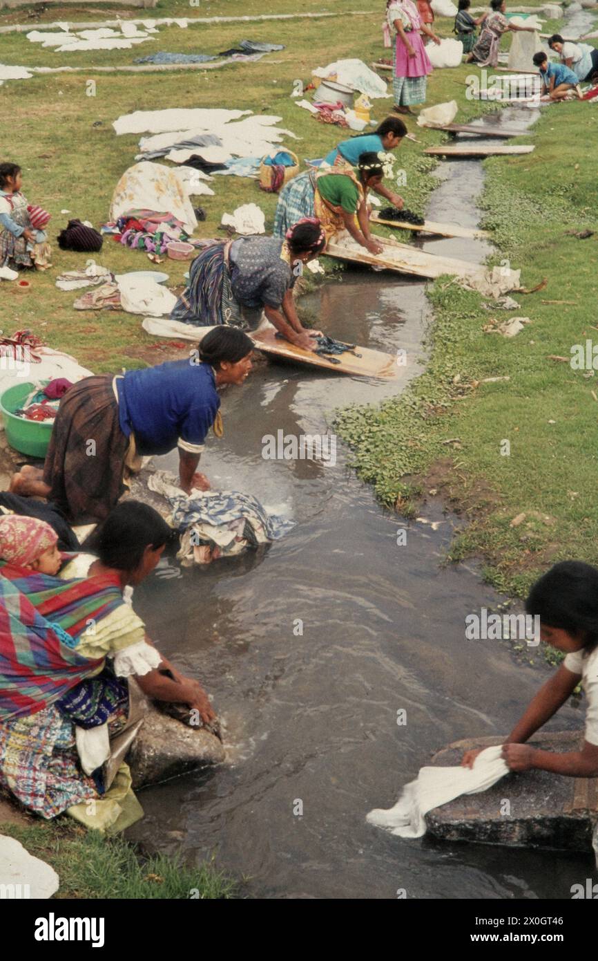Laundry washing Quiche Indian women at a creek in Salcaja Stock Photo ...