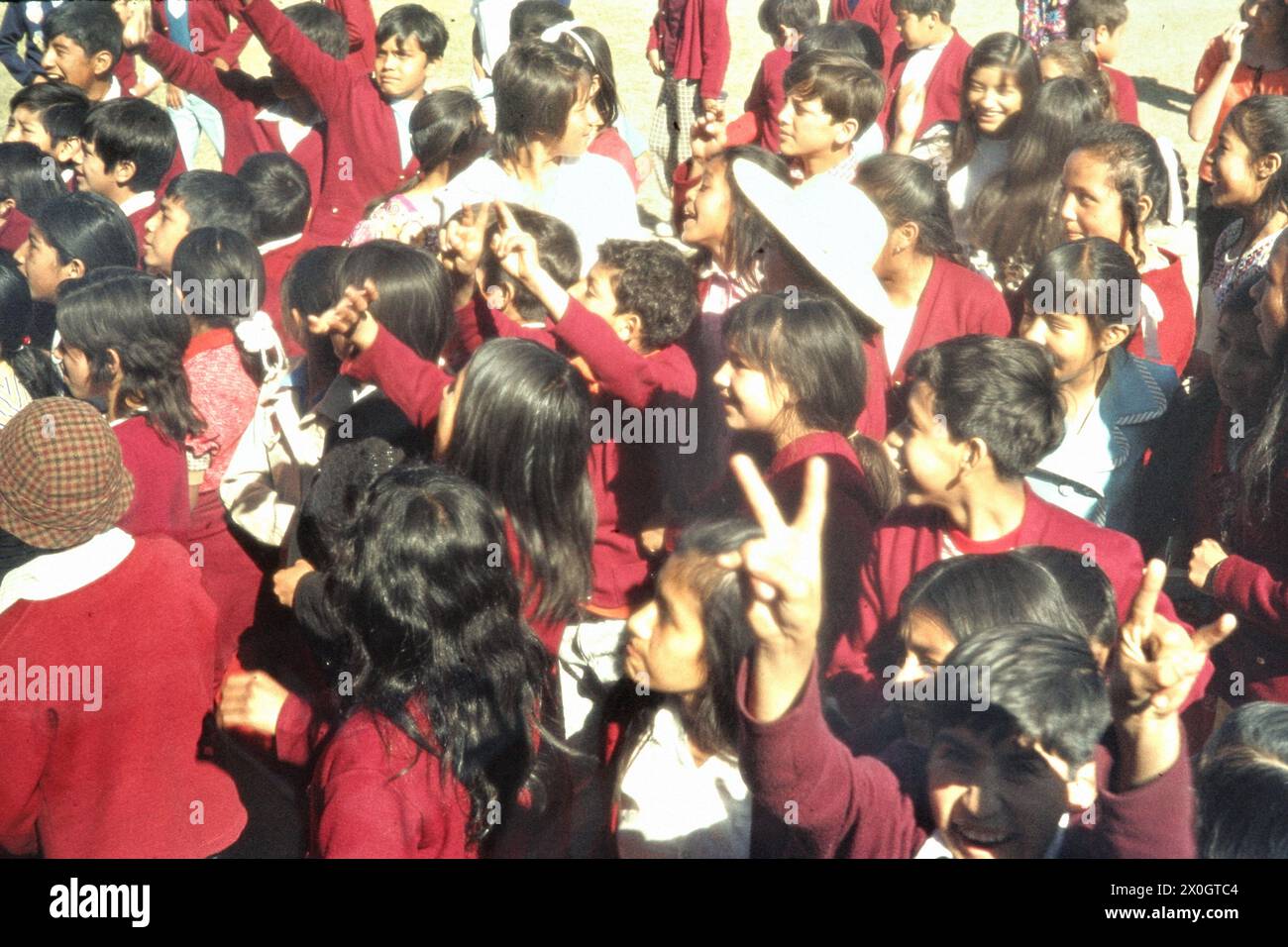 A school class in red uniform during an excursion in Teotihuacán ...