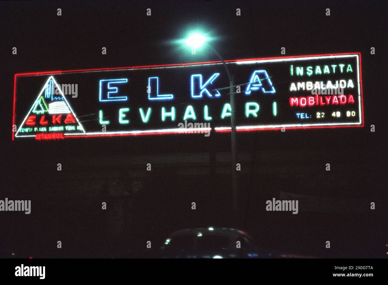 A neon sign in Taksim Square in Istanbul at night. [automated ...