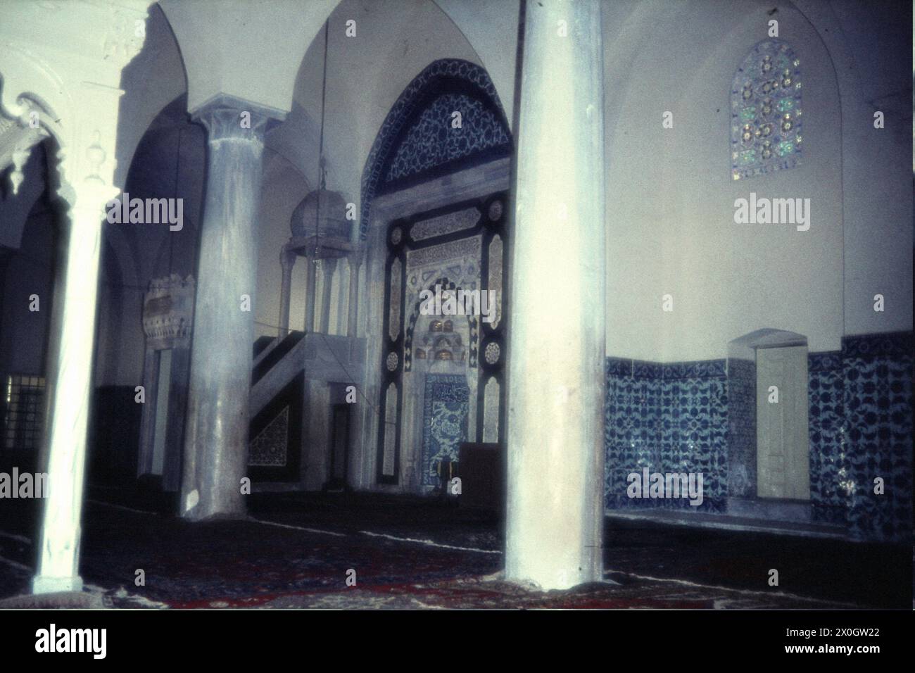 Interior view with mihrab (prayer niche) and minbar (pulpit) of the Ulu ...
