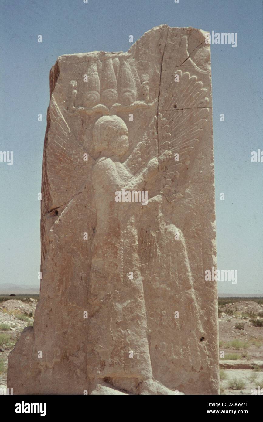 A relief of the Zoroatric god Ahura Mazda on a wall near the tomb of ...