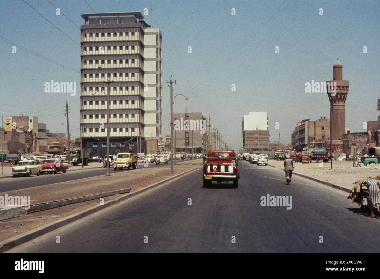 Cars on the busy Houria Street at the Moskovich mosque in Baghdad's ...