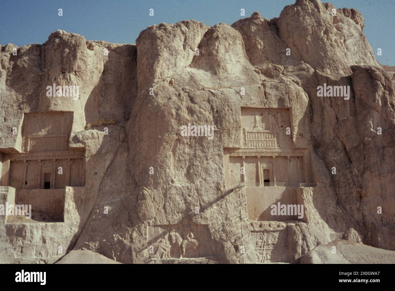The graves of the kings Darius I and Xerxes in Naqsch-e Rostam, carved ...
