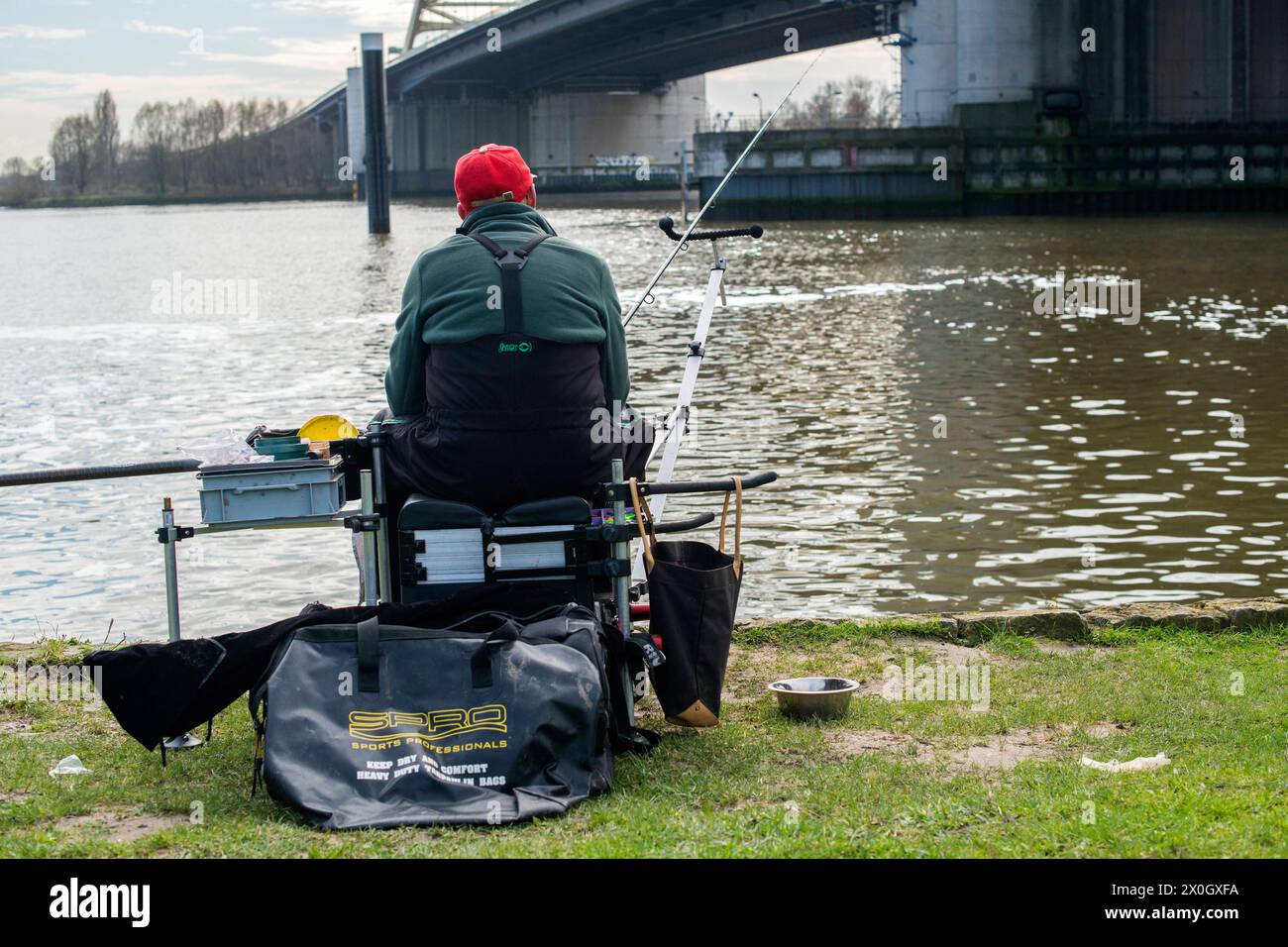 Man Fishing at Nieuwe Maas River Senior adult and retired male fishing ...