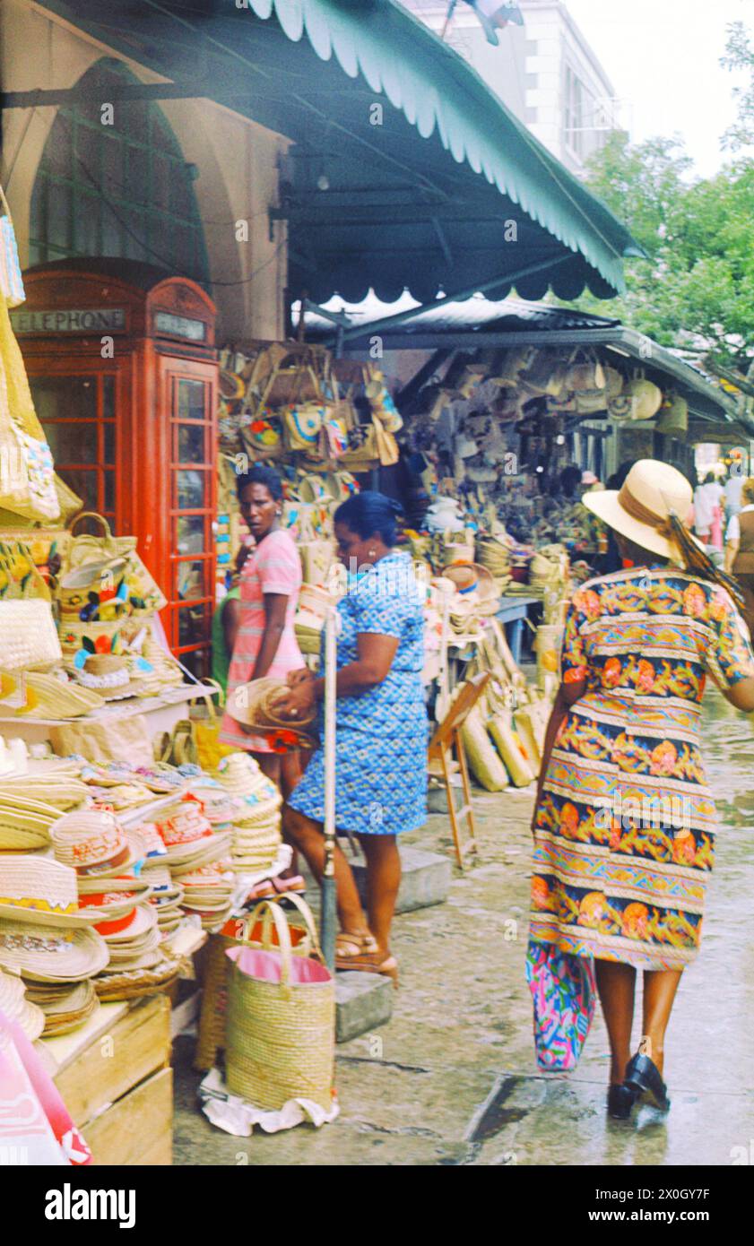 Street scene with 3 local women in Nassau, Bahamas. [automated ...