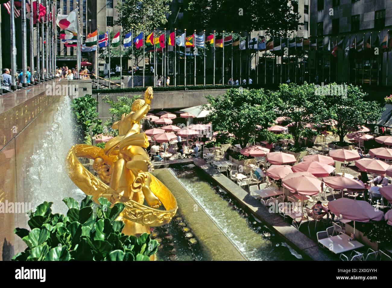 The golden Prometheus figure of the artist Paul Manship in front of the ...