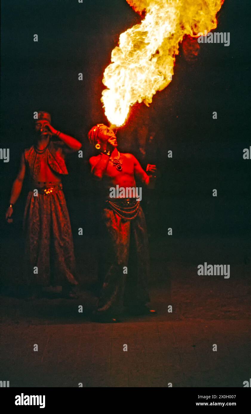 Fire and sword swallower at the Circus Roncalli in Munich. [automated ...