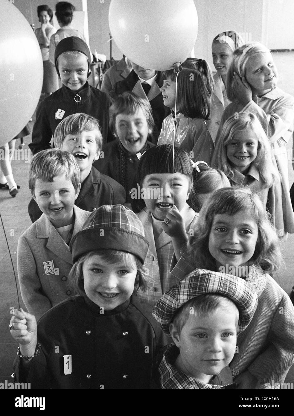 Shot during a children's fashion show. In the picture, all the children ...