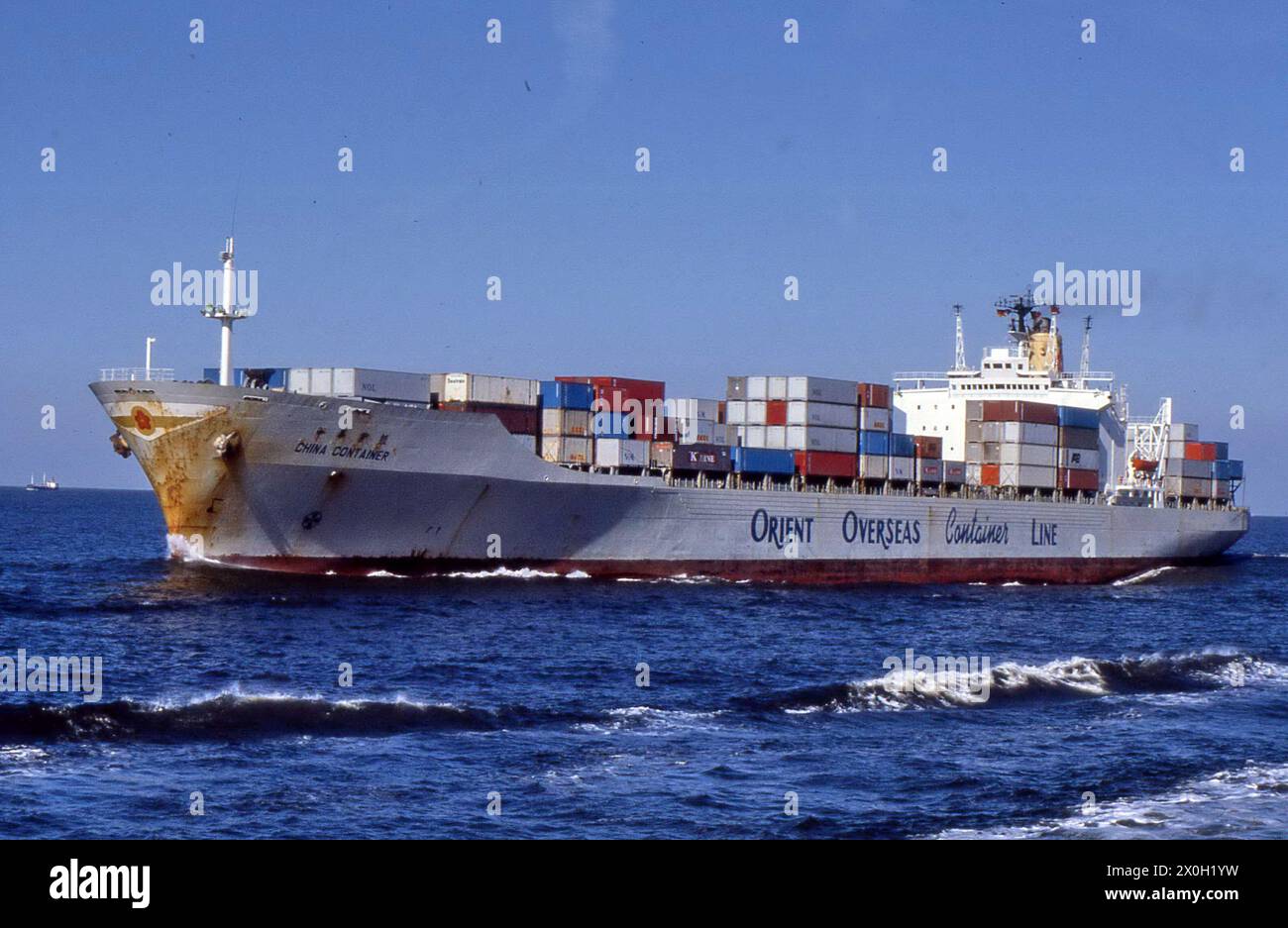 A container ship with the inscription 'Orient Overseas Container Line ...