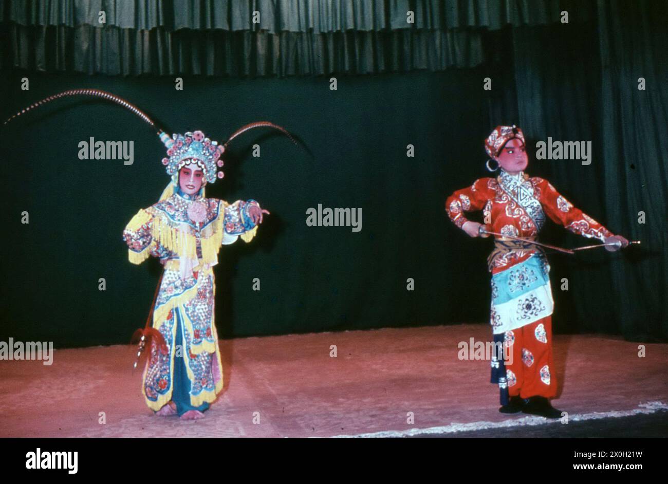 Two opera performers on stage in Beijing Stock Photo - Alamy