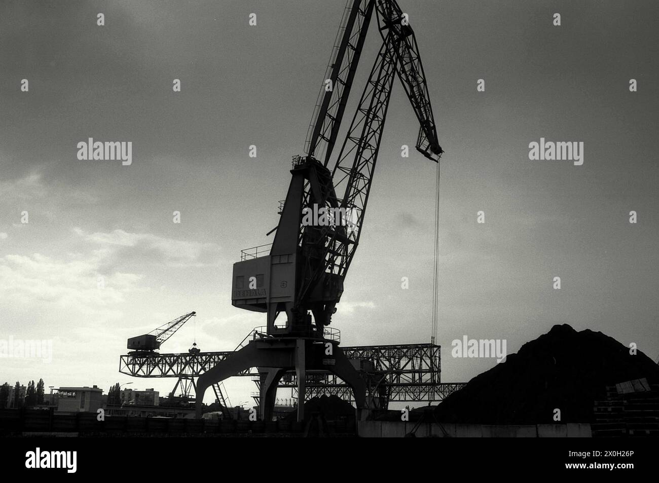 Cranes for loading and unloading of ships in the Westhafen in Berlin ...