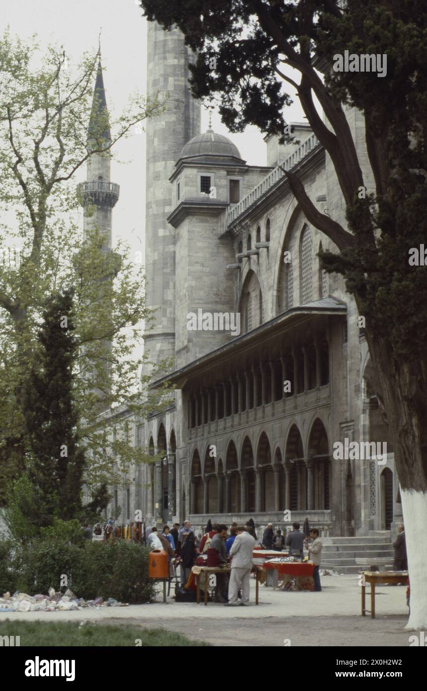 The Suleymaniye Mosque and minaret in Istanbul. Outside the mosque ...