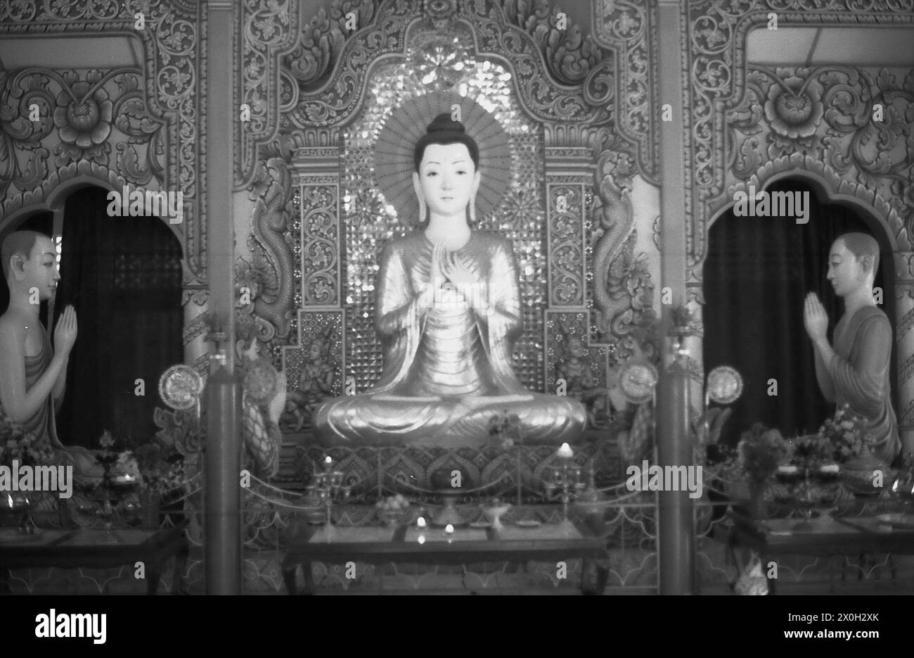 Praying sculptures in a Thai temple in Penang in Malaysia (undated ...