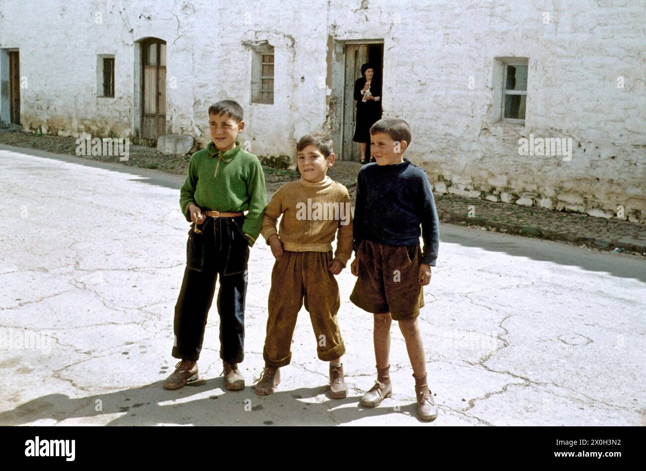 Three Spanish boys in a village Stock Photo - Alamy