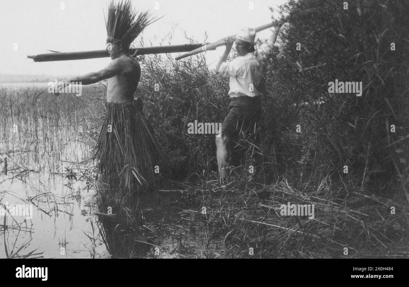 Man disguised as tree Black and White Stock Photos & Images - Alamy