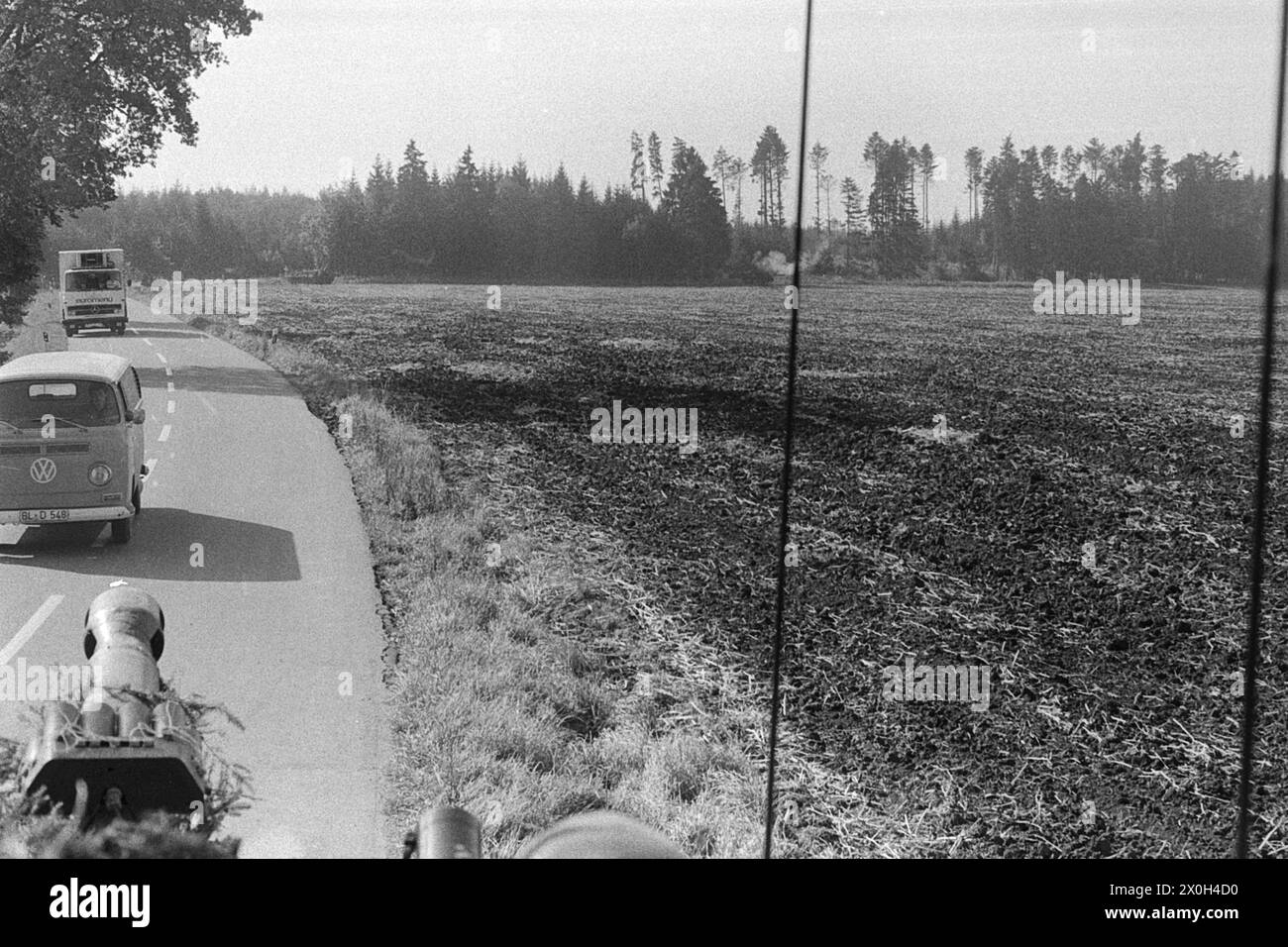 A Bundeswehr tank destroyer is driving along a country road during a ...