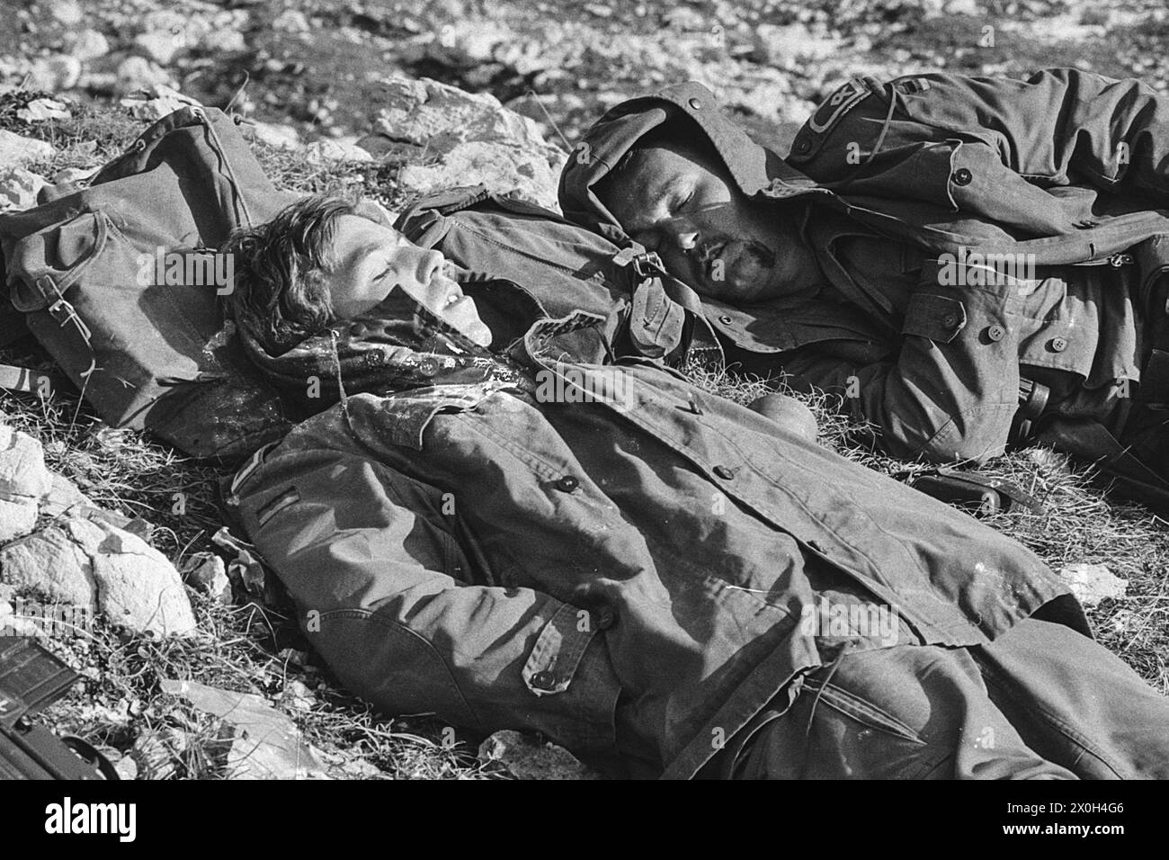 During the lunch break, the soldiers treat themselves to a quick nap ...