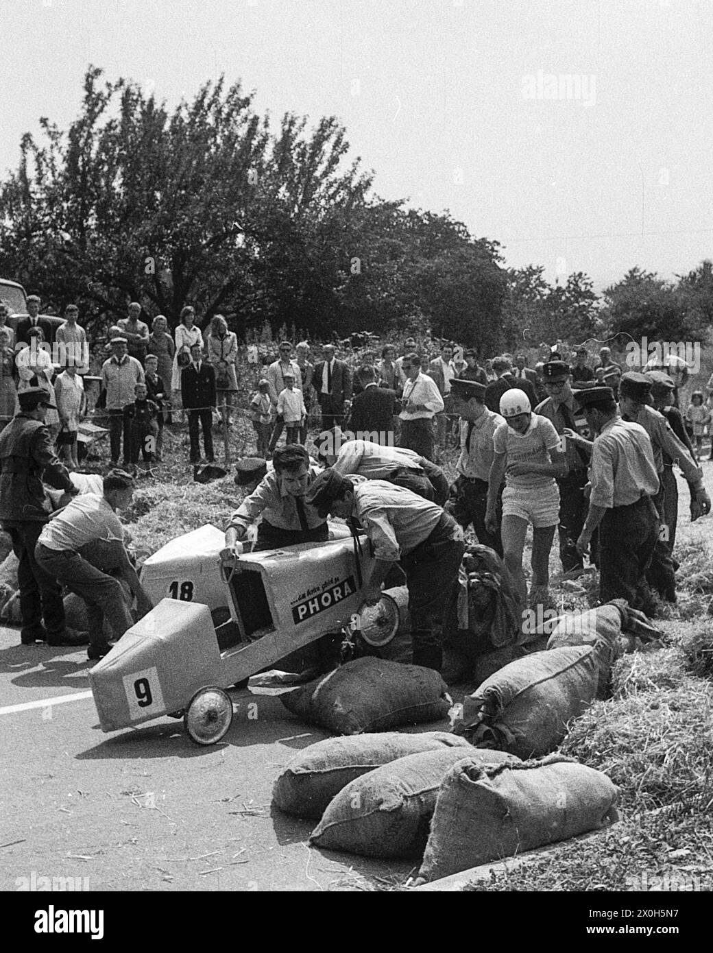 "After the finish, the soapboxes are slowed down by bales of straw ...