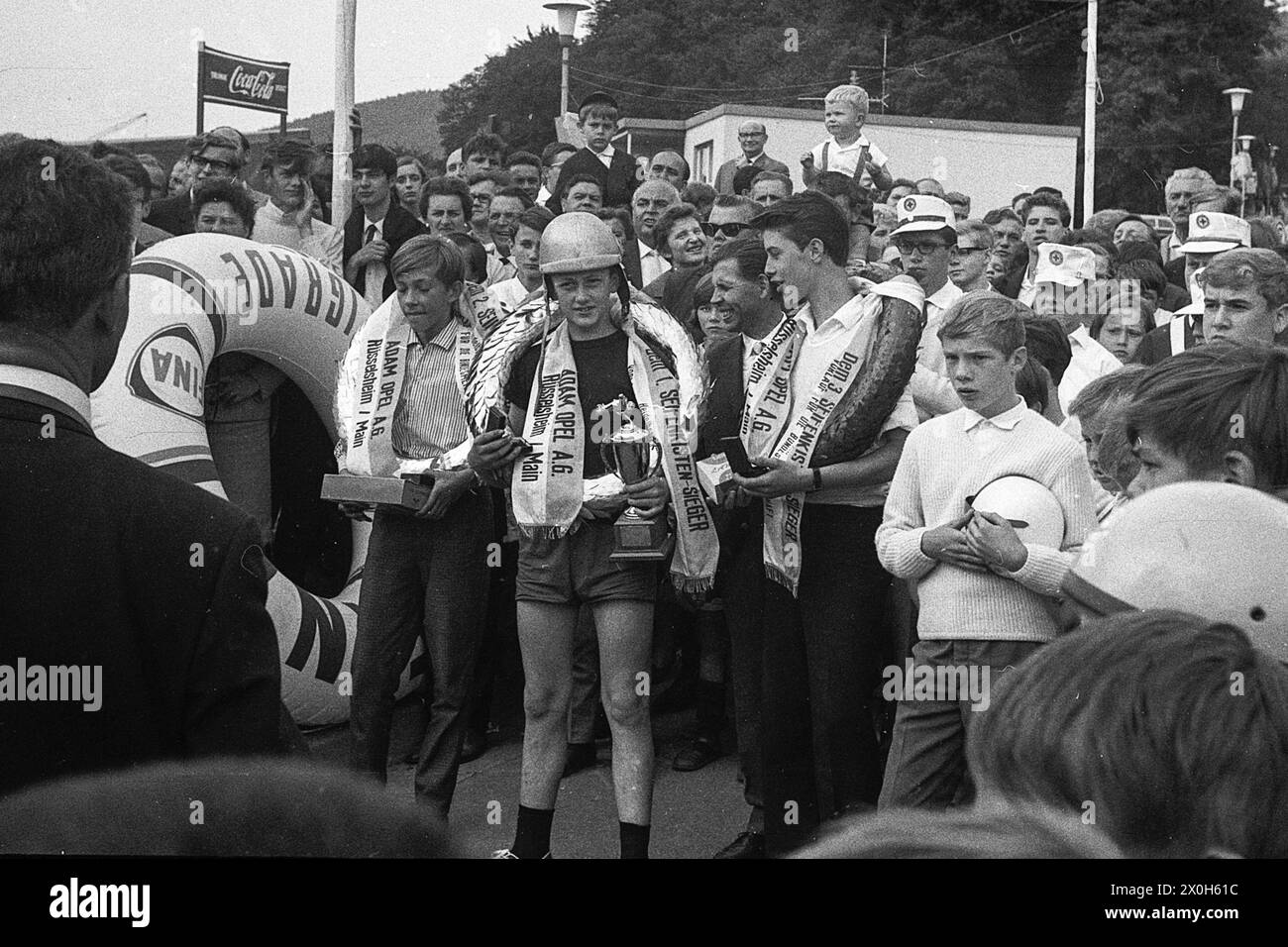 "Surrounded by happy spectators and school crossing guards, the three ...